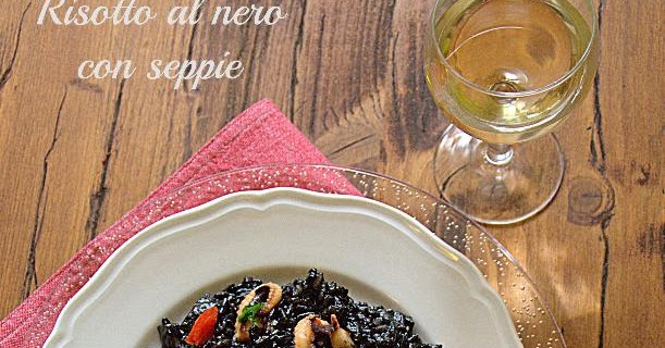 Risotto al nero con seppie- Black risotto with cuttlefish